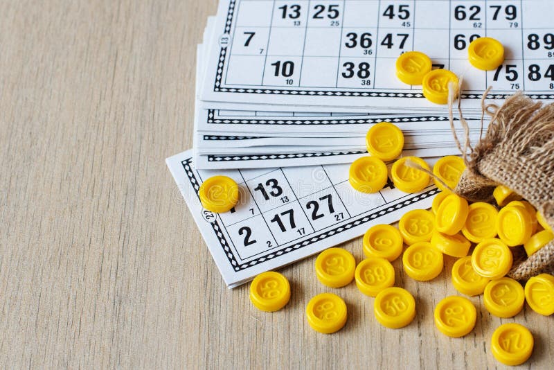 Old Tabletop Game Lotto. Cards Bingo and Yellow Game Chips with Numbers ...