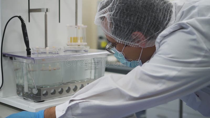 Tablets Being Tested in the Dissolution Apparatus at the Pharmaceutical ...