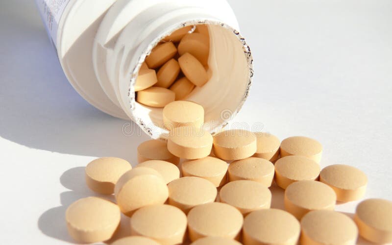 Tablets and bottle stock image. Image of open, pharmacist - 12847651