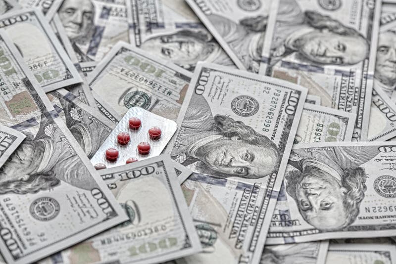 Tablets Close-up on the Background of Money Stock Image - Image of ...