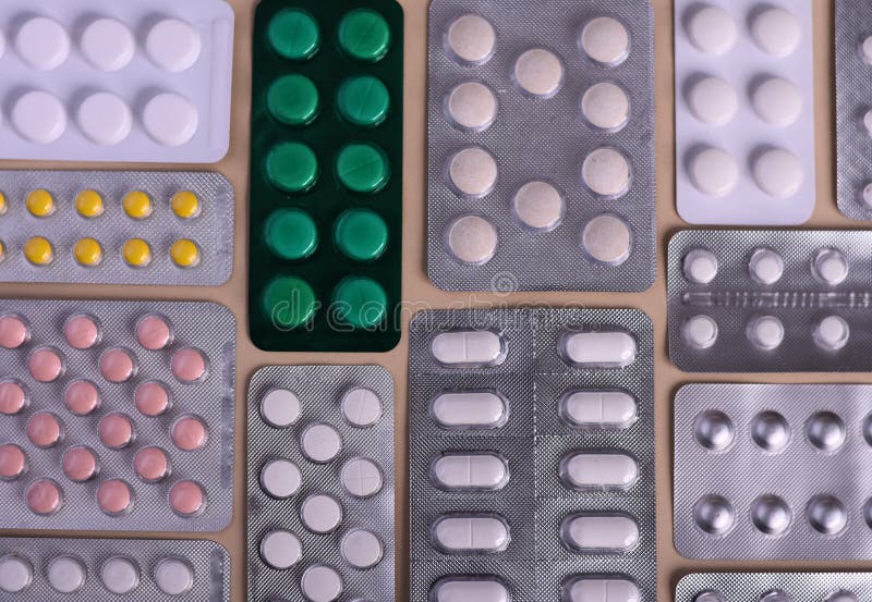 Tablets of Different Colors and Sizes. Background of Tablets Stock ...