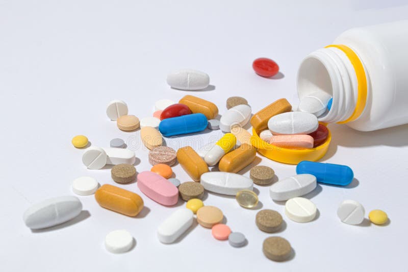 Tablets of Different Shapes and Colors are Scattered on the Table Stock ...