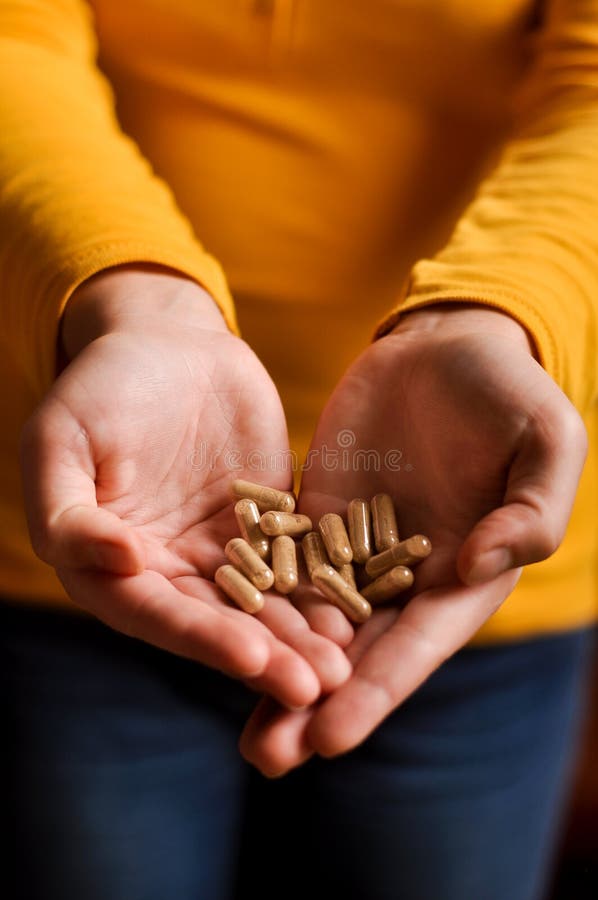 Tablets held in the hand stock image. Image of white - 44601409