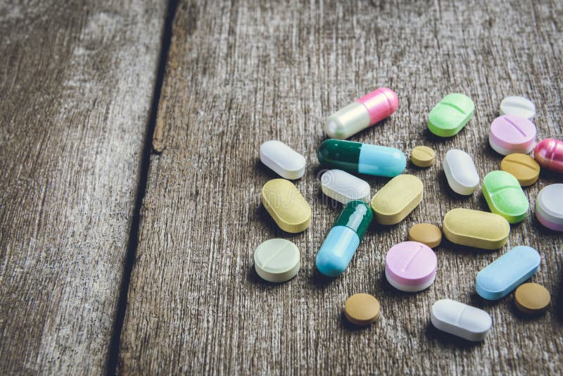 Tablets and Pills on the Table Stock Photo - Image of painkiller ...