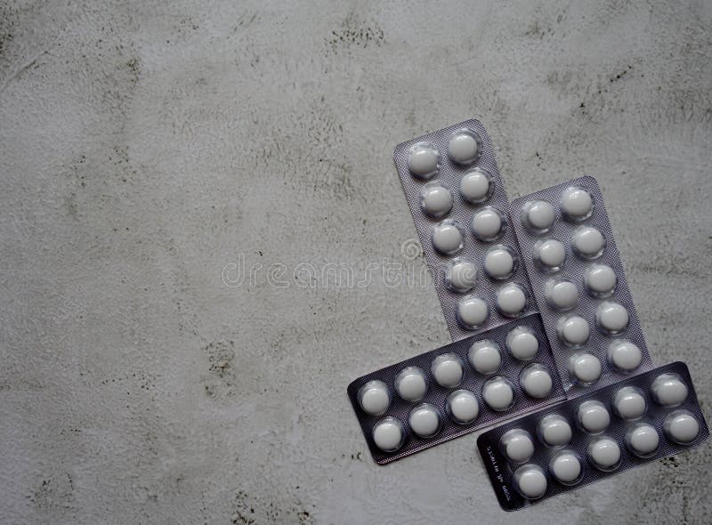 Layout of Tablets in Plastic Packaging on a Light Background Stock ...
