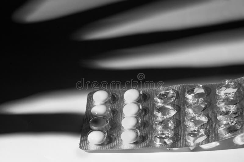 Tablets with Shadow of Abstract Hand Stock Photo - Image of grab, drugs ...
