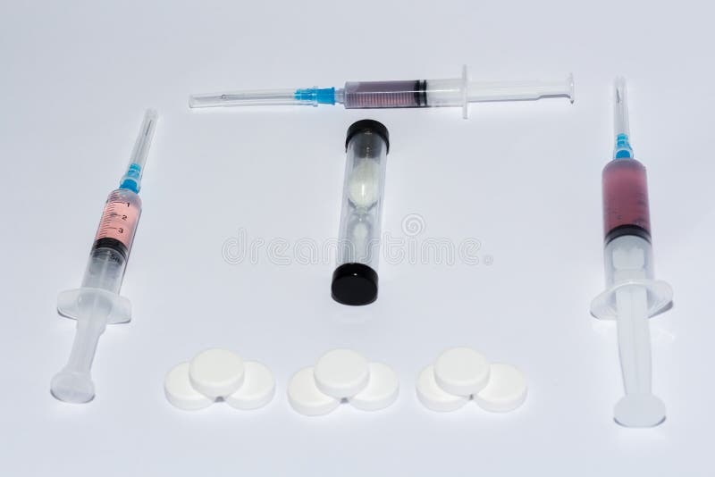 Tablets and Syringe on White Background Isolate Stock Photo - Image of ...