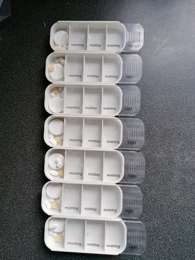 Tablets in there daily box stock photo. Image of stacker - 182007482