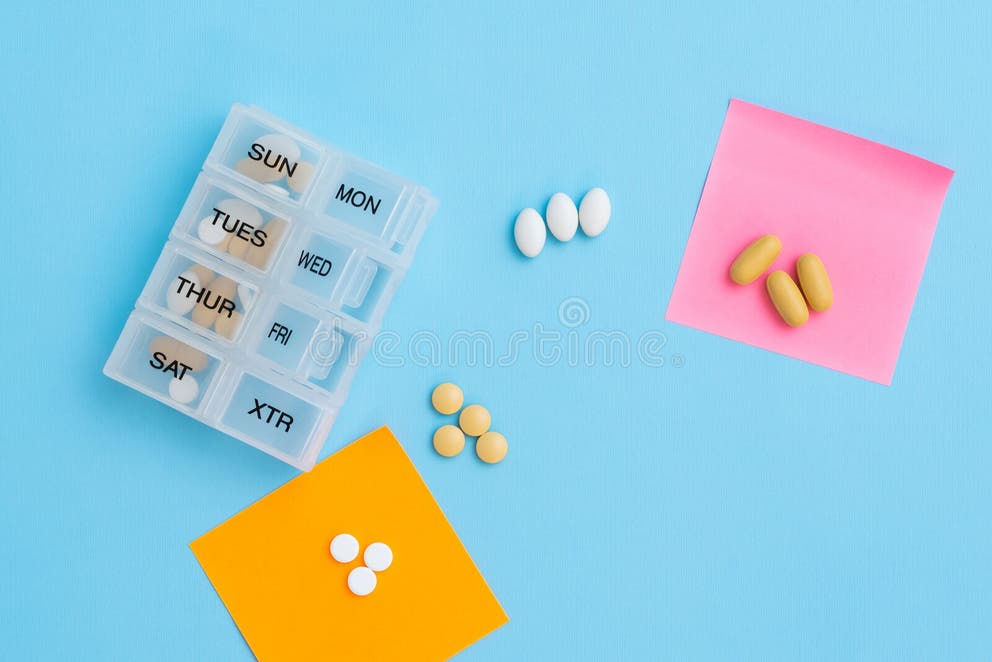 Tablets from the Weekly Organizer Laid Out on Multi-colored Stickers ...