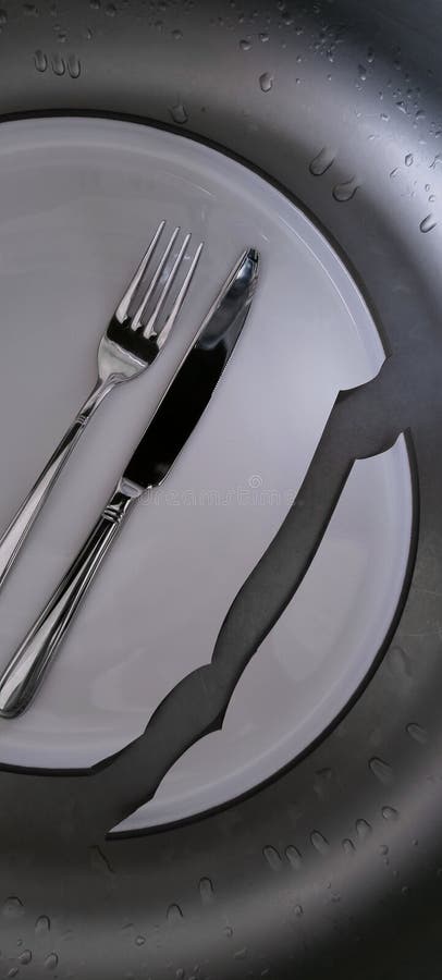 Tableware Lays Over the Broken Plate. Knife and Fork on the Dining ...