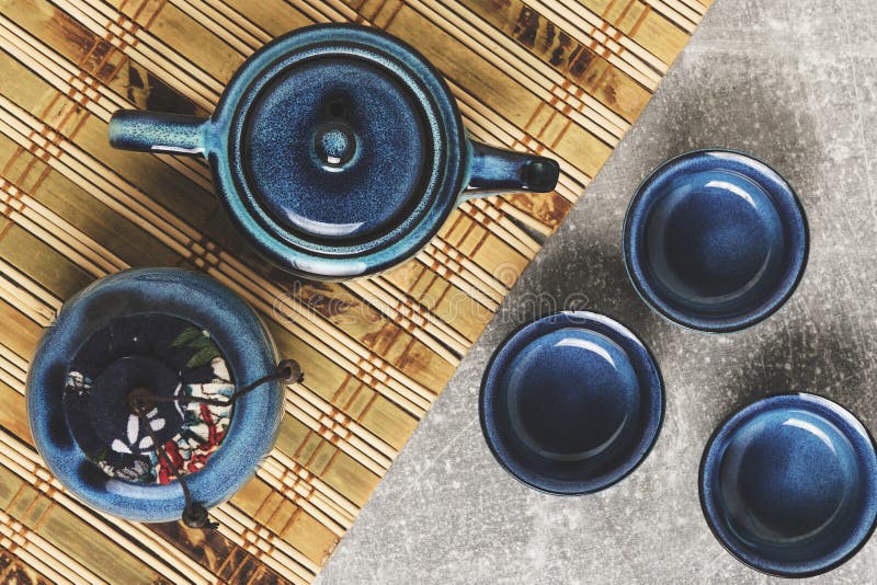 Tableware for Tea Ceremony Top View. Blue Tea Set Pottery on Bamboo ...