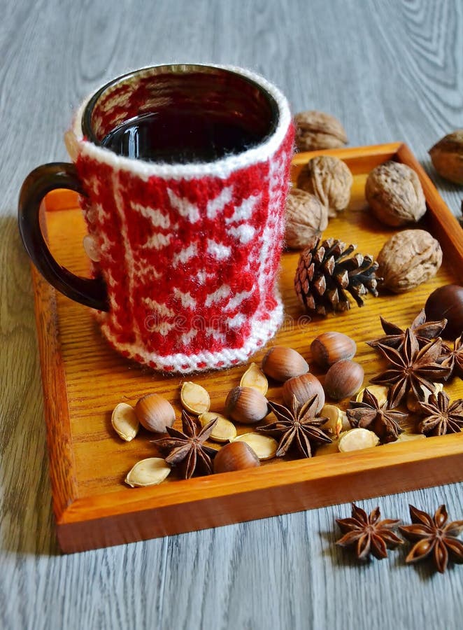 Cup of coffee with nuts stock image. Image of winter - 354364033
