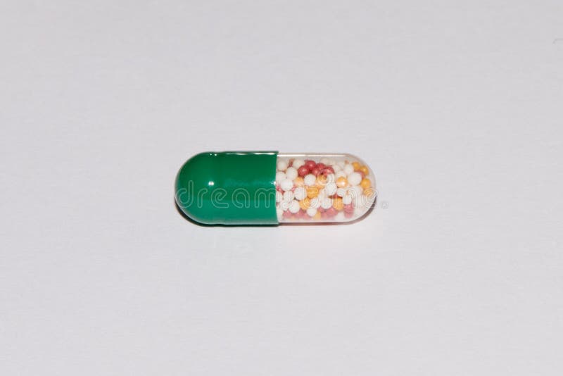 Tabs Vitamins, Omega 3, Medications Tablets and Capsules in a Beaker ...