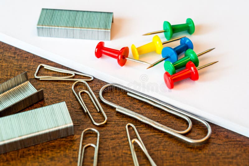 Tacks, Clips and Paper on the Table Stock Photo - Image of clip ...