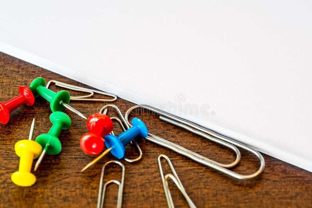 Tacks, Clips and Paper on the Table Stock Photo - Image of clip ...