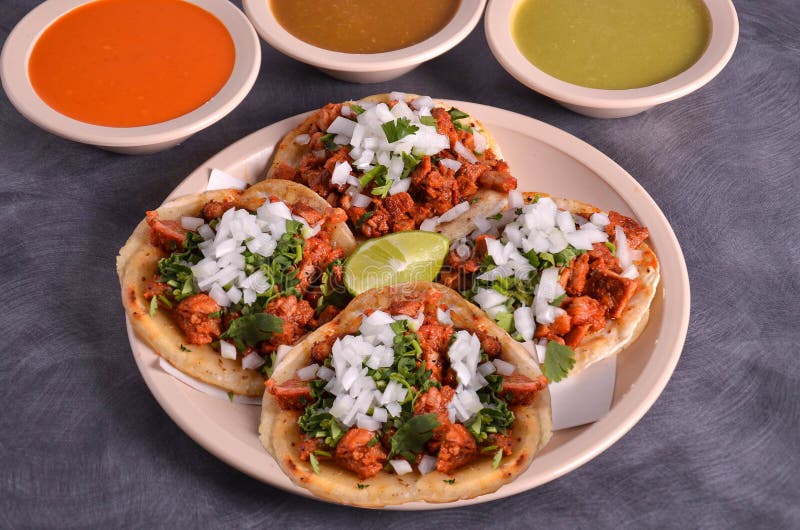 Four tacos on a plate stock image. Image of pastor, four - 99137503