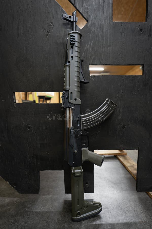 Tactical AK Carbine Rifle in a Shooting Range. Vertical Photo Stock ...