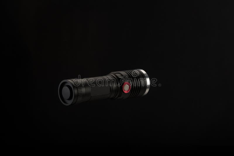 Tactical Flashlight on a Black Background Stock Image - Image of energy ...