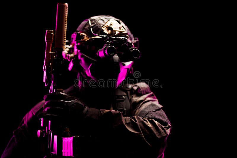 Tactical Operative Wearing Night Vision Gear in Dramatic Lighting Stock ...