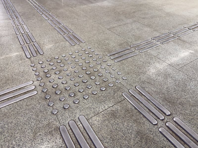 Tactile Paving System with Directional and Warning Tiles on Polished ...