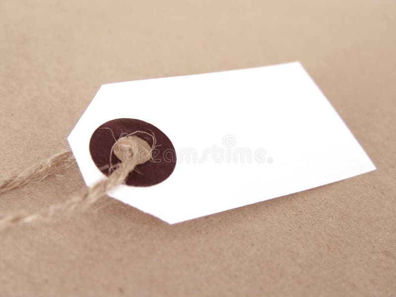 A Shipping Box Ties with String with a Blank Label Stock Photo - Image ...