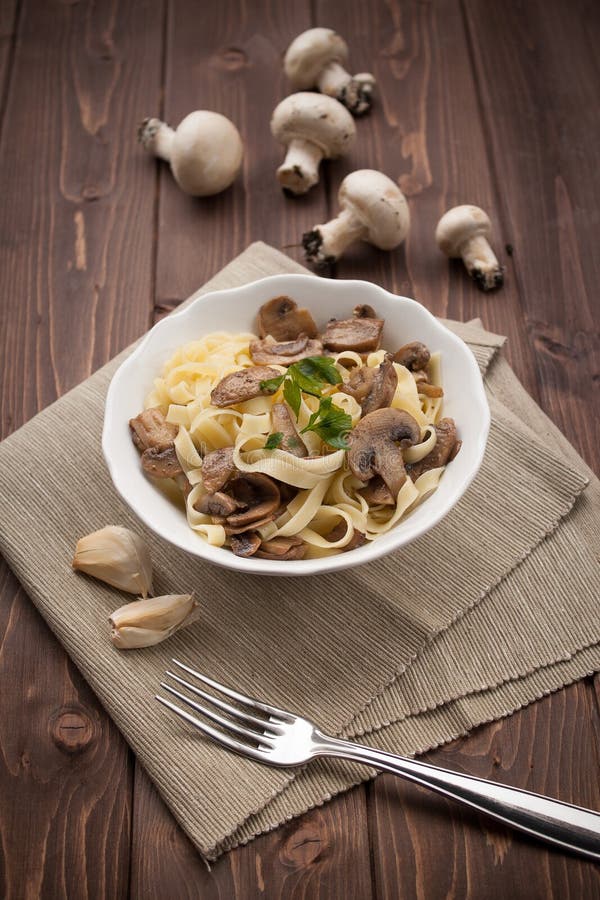 Tagliatelle Ai Funghi - Noodles with Mushroom Stock Photo - Image of ...