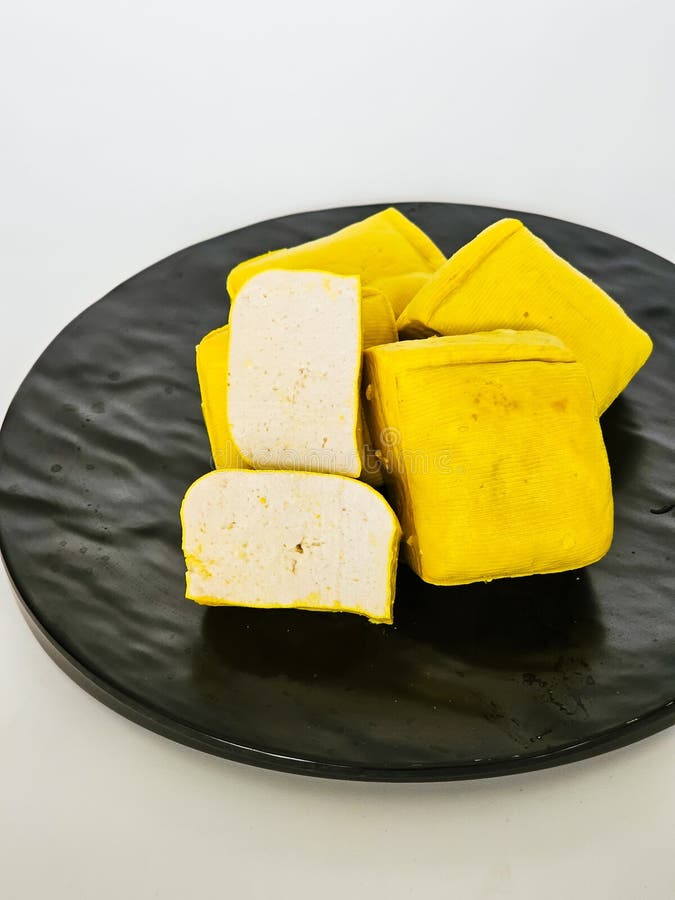Tahu kuning or yellow tofu stock photo. Image of vegetable - 349063132