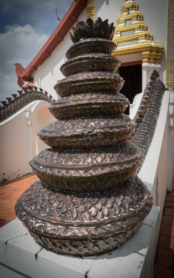Tail end of Naga stock image. Image of tail, metal, statue - 79559715