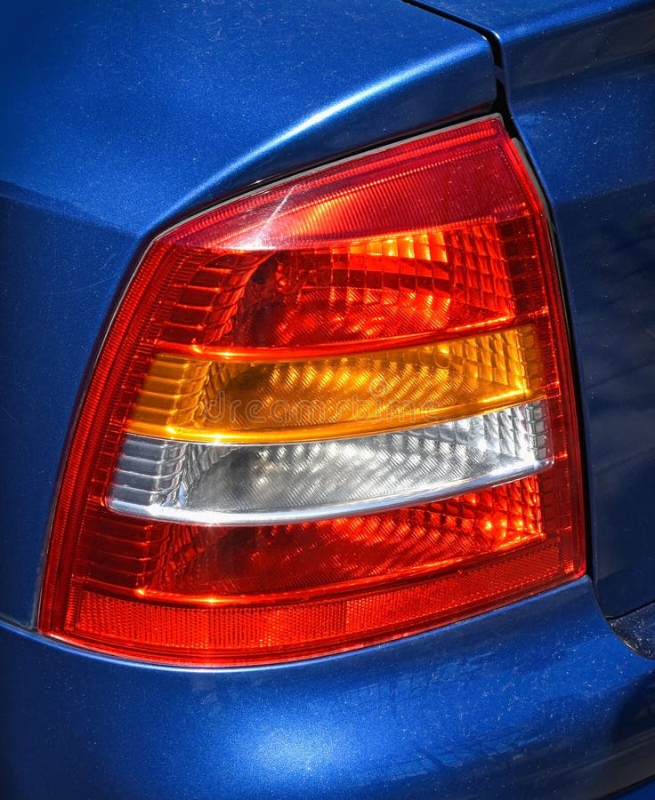 Tail light of a blue car stock image. Image of white - 215506643