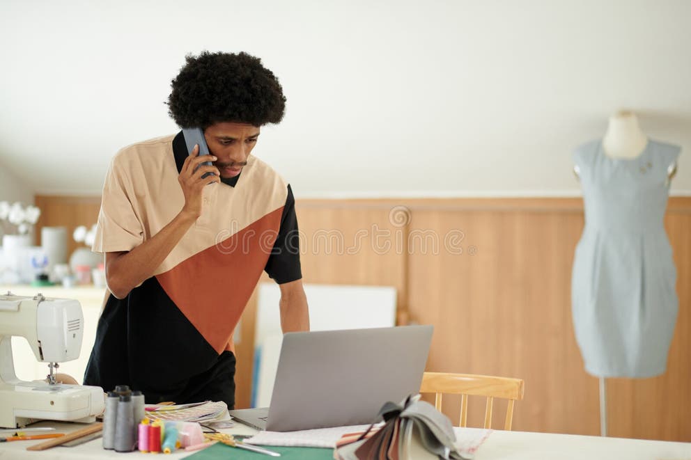 Tailor Calling Client stock photo. Image of details - 291407330