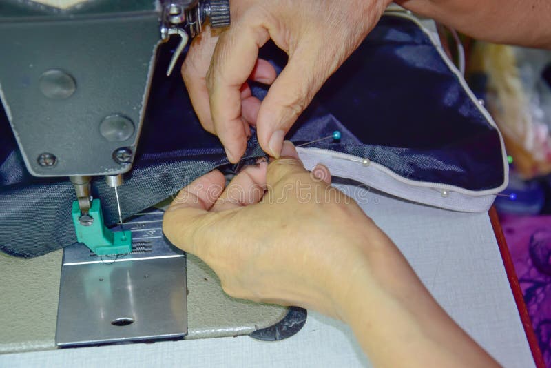 Tailor is Changing the Zip 3 Stock Image - Image of machinery, title ...