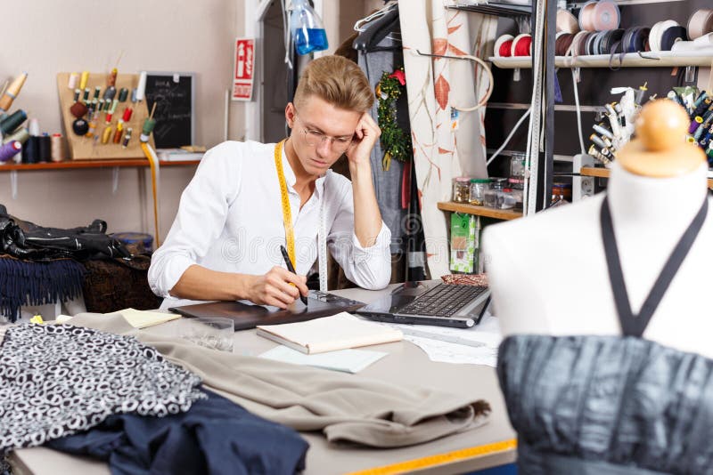 Tailor Creating Pattern Using Graphics Tablet Stock Image - Image of ...