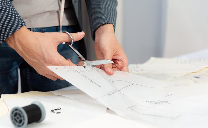 Tailor Cutting Sewing Pattern. Stock Image - Image of seamstress ...