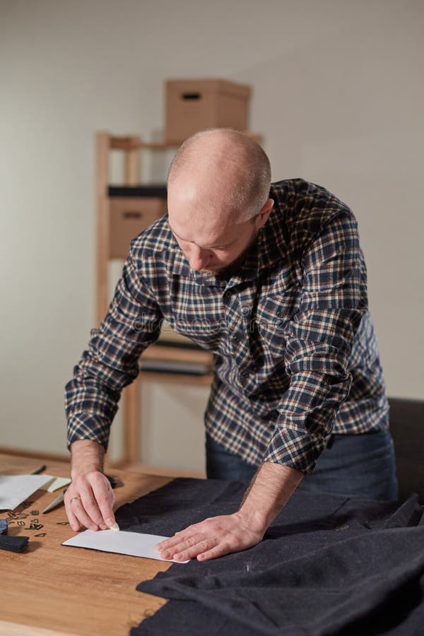 Tailor Cutting Wool Fabric. the Line Pattern. Craftsman Makes ...