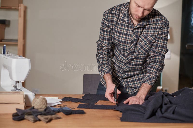 Tailor Cutting Wool Fabric. the Line Pattern. Craftsman Makes ...
