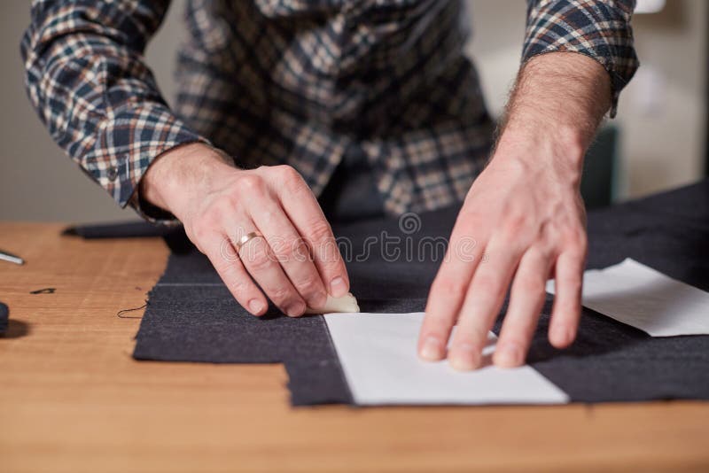 Tailor Cutting Wool Fabric. the Line Pattern. Craftsman Makes ...