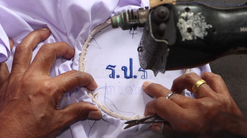 Tailor Embroiders Letters - Initials into a White Shirt on an Old ...