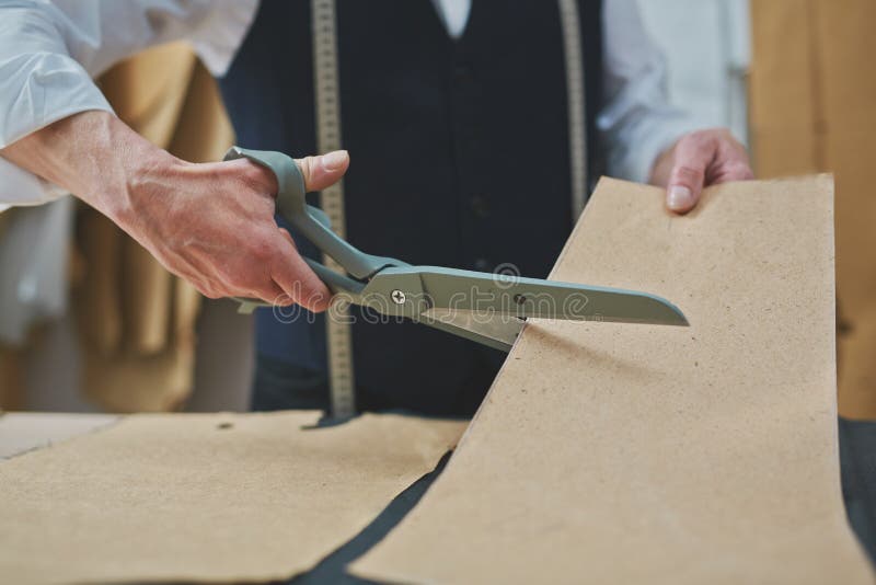 Tailor Fitting Clothing Patterns in Atelier Stock Image - Image of ...