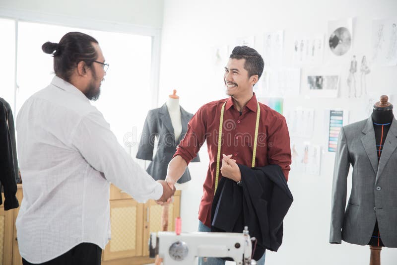 Tailor with His Customer Talking Stock Photo - Image of attractive ...