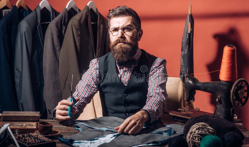 Tailor in His Workshop. Suit Tailoring. Handsome Man is Classic Tailor ...