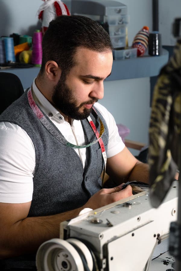 Tailor Man sewing stock photo. Image of couture, cloth - 264510284