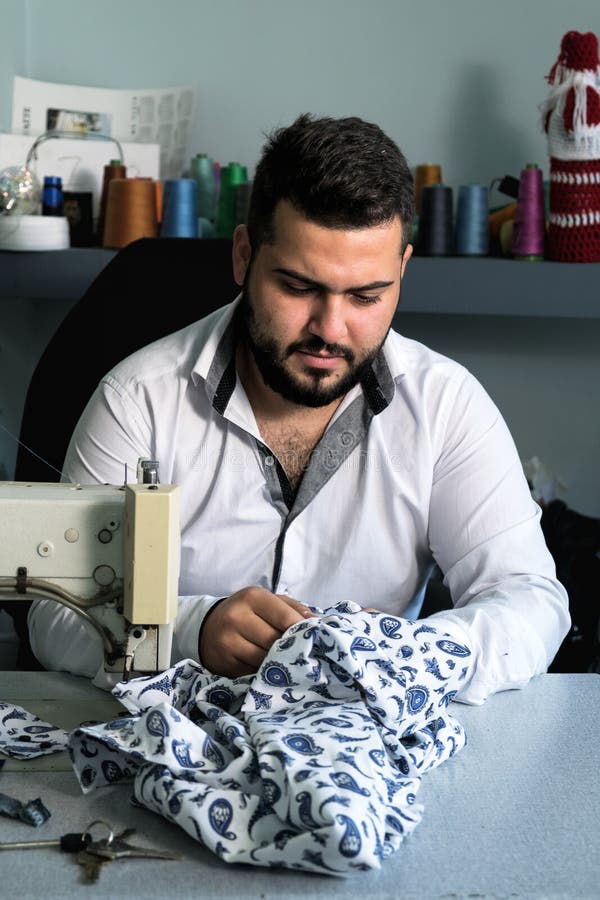 Tailor Man sewing stock photo. Image of atelier, crafts - 264514234