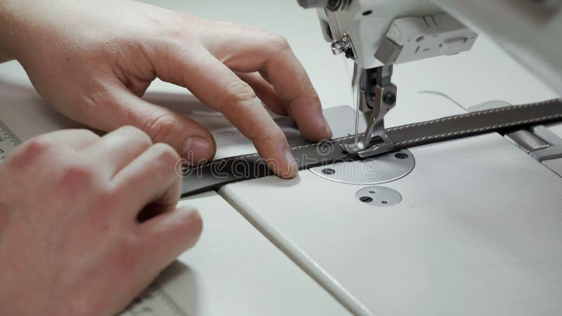 Tailor Man Sewing at Workplace. Man Hands Sewing on Machine, Close-up ...
