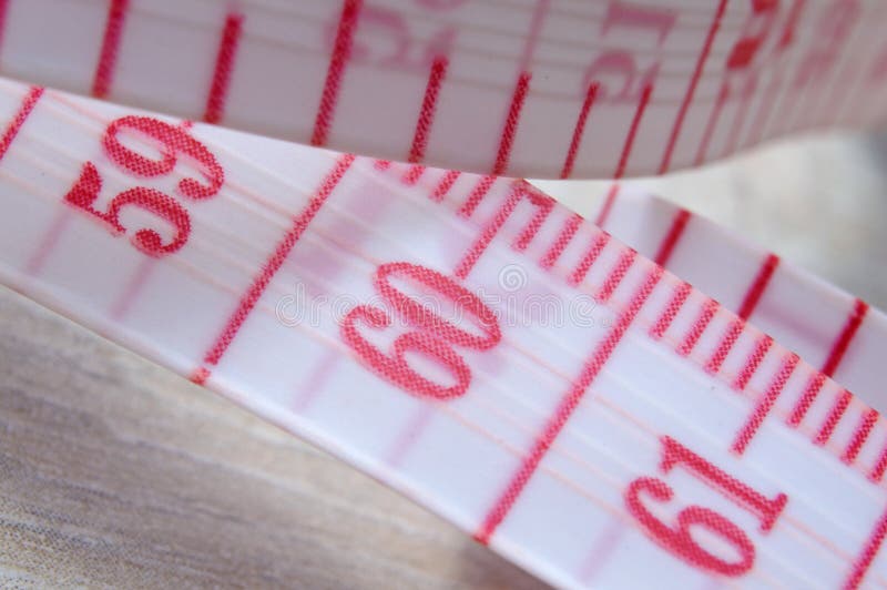 Tailor Measuring Tape with Red Numbers. Close Up Stock Photo - Image of ...