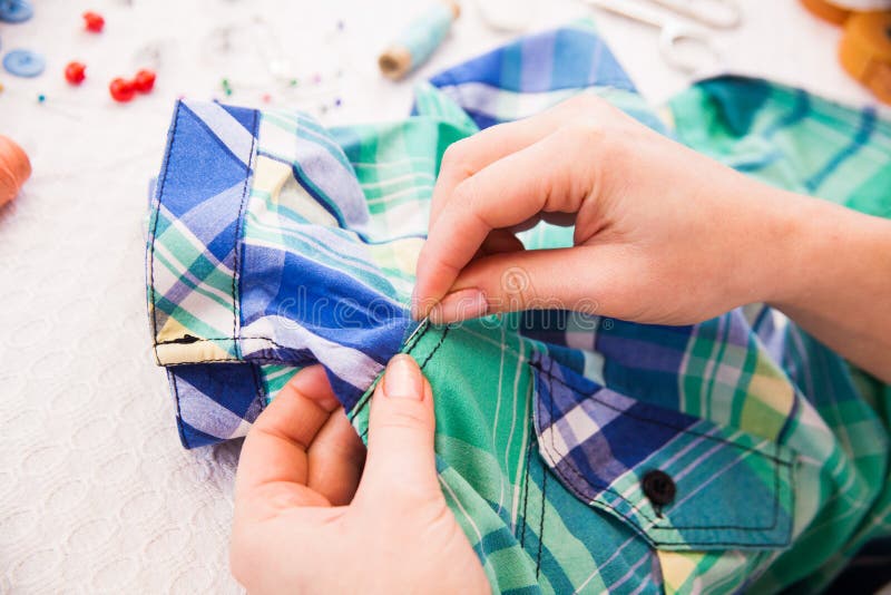 A tailor doing alterations stock image. Image of alterations - 35016883