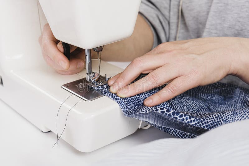 Tailor Sews Clothes on an Electric Sewing Machine Stock Image - Image ...