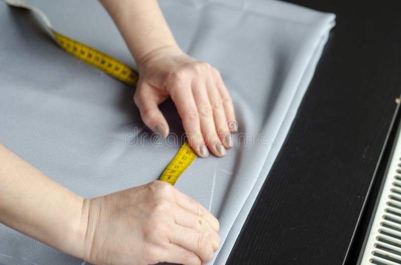 Tailor Sews a Dress 2 stock photo. Image of dressmaking - 178321324