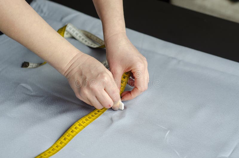 Tailor Sews a Dress 2 stock image. Image of custom, garment - 178321919