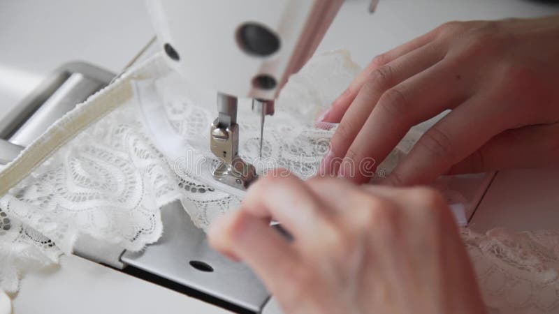 Tailor Sews Lingerie on a Sewing Machine, Thread and Lace, Handmade ...