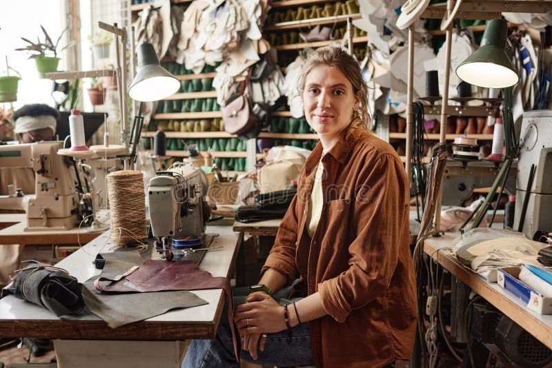 Tailor Sitting at Her Workplace in the Factory Stock Image - Image of ...